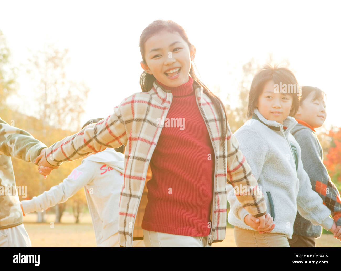 Friends playing together Stock Photo - Alamy