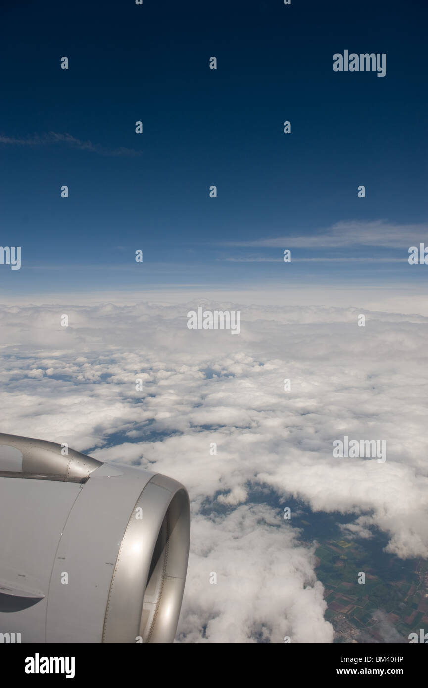 View from a commercial jet's window with clouds and horizon, Europe ...