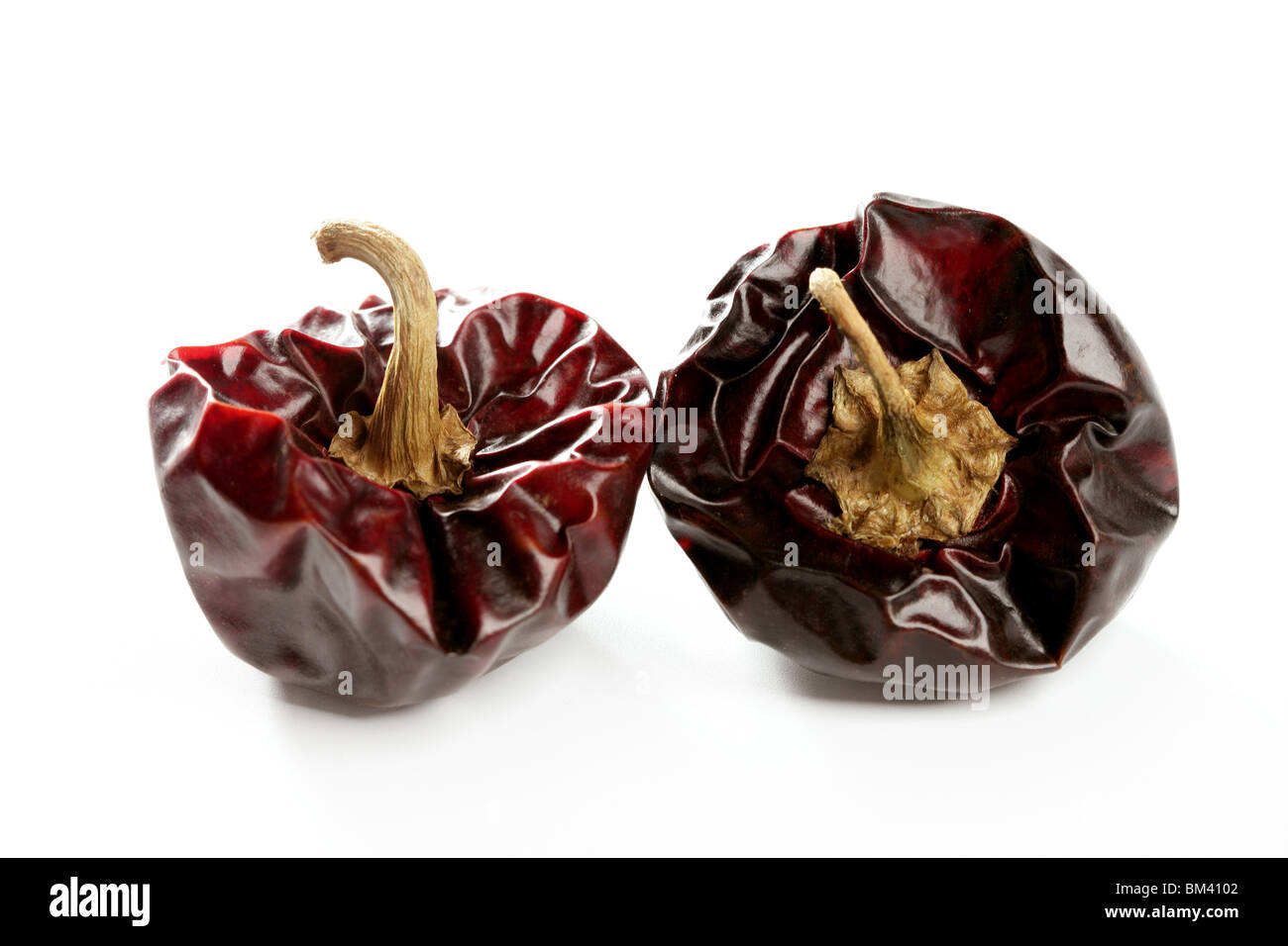 Dried red chilli dark background Cut Out Stock Images & Pictures - Alamy