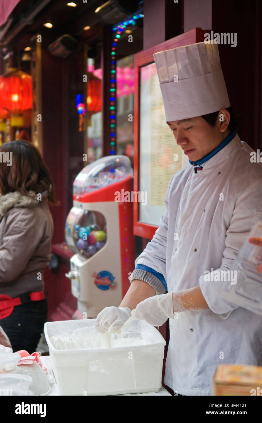 Demonstration of Chinese sweet candy in China Town, Chinese New Year ...