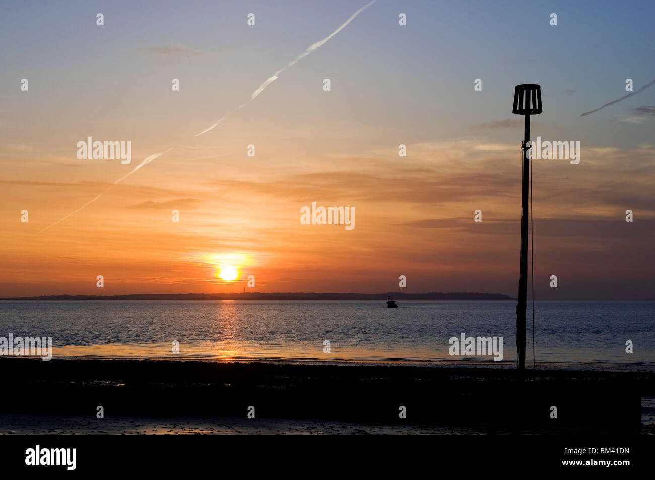 Sunset Whitstable beach kent England Stock Photo - Alamy