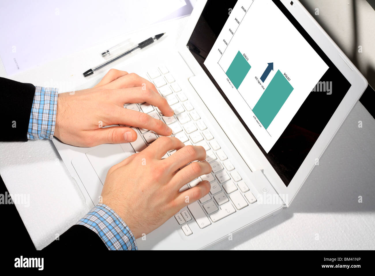 Busy business man doing some computer work Stock Photo - Alamy