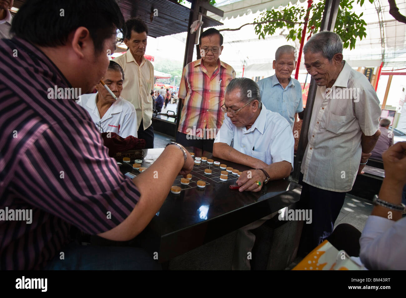 Men playing Xiangqi (Chinese chess) in Chinatown, Singapore Stock Photo ...