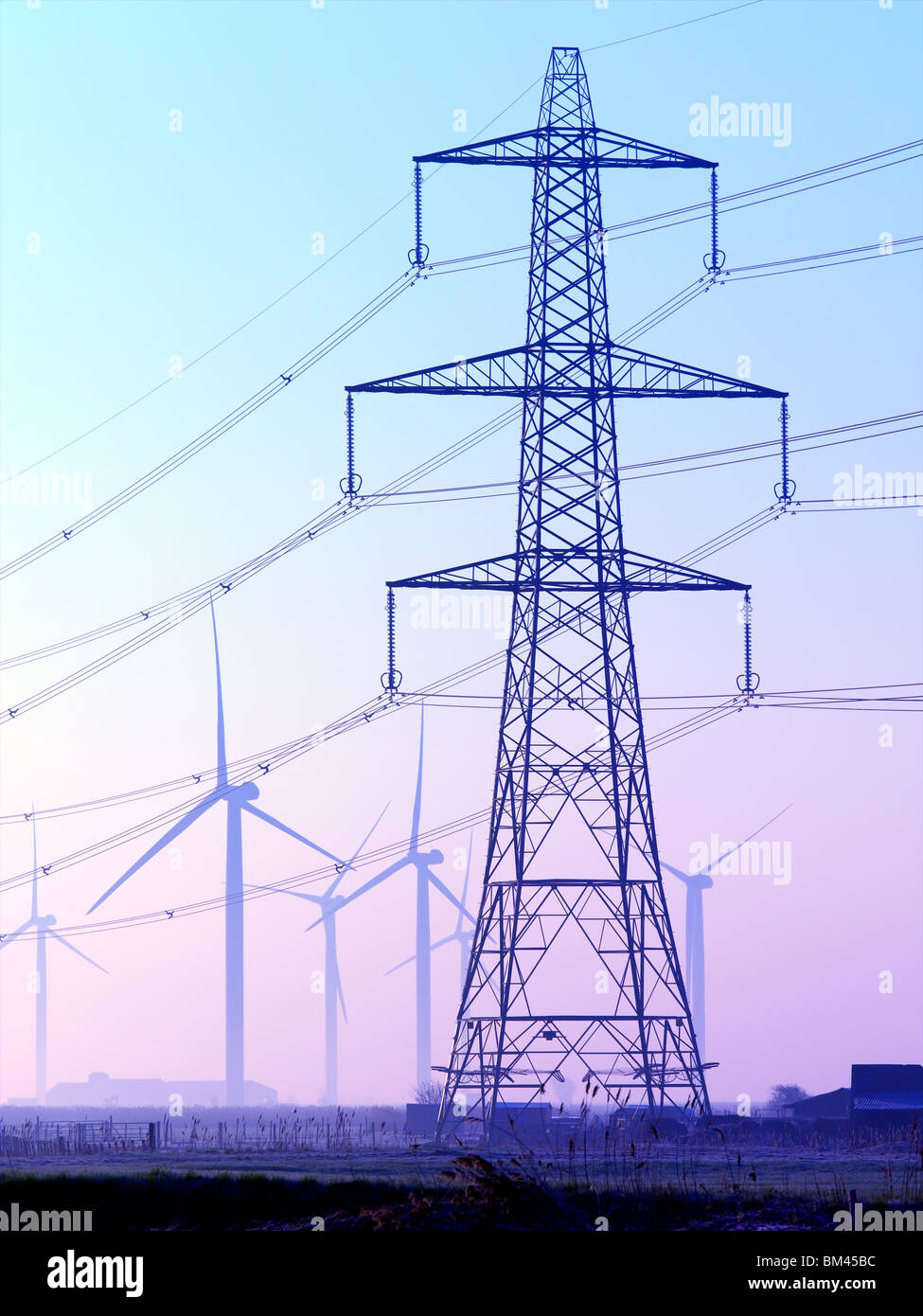 Electricity Pylons & Wind Farm Stock Photo - Alamy