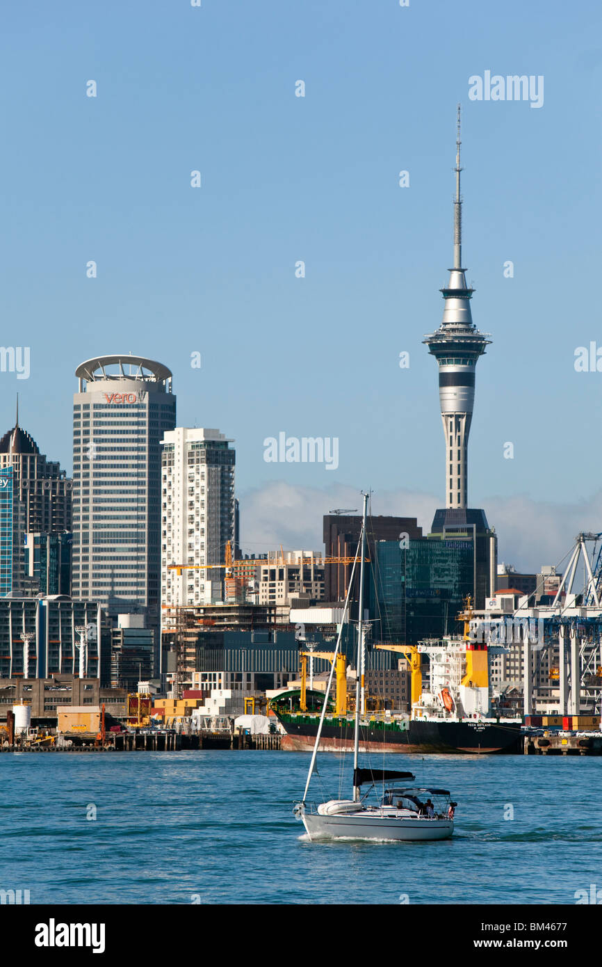 Boat on Waitemata Harbour with the city skyline in background. Auckland ...