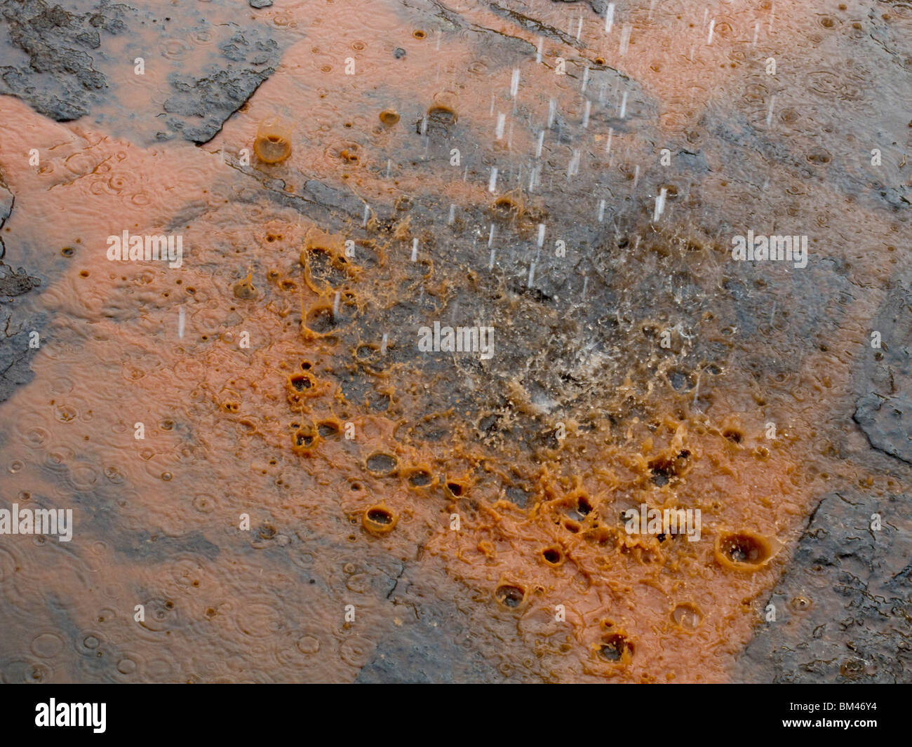 Heavy rain on rock surface Stock Photo - Alamy