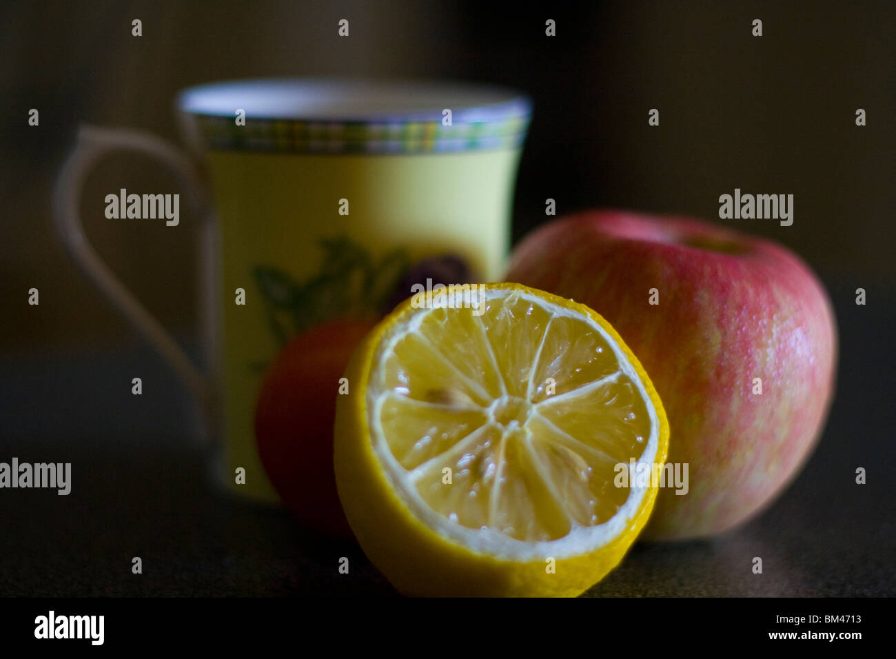 Still life with mug and fruit Stock Photo - Alamy