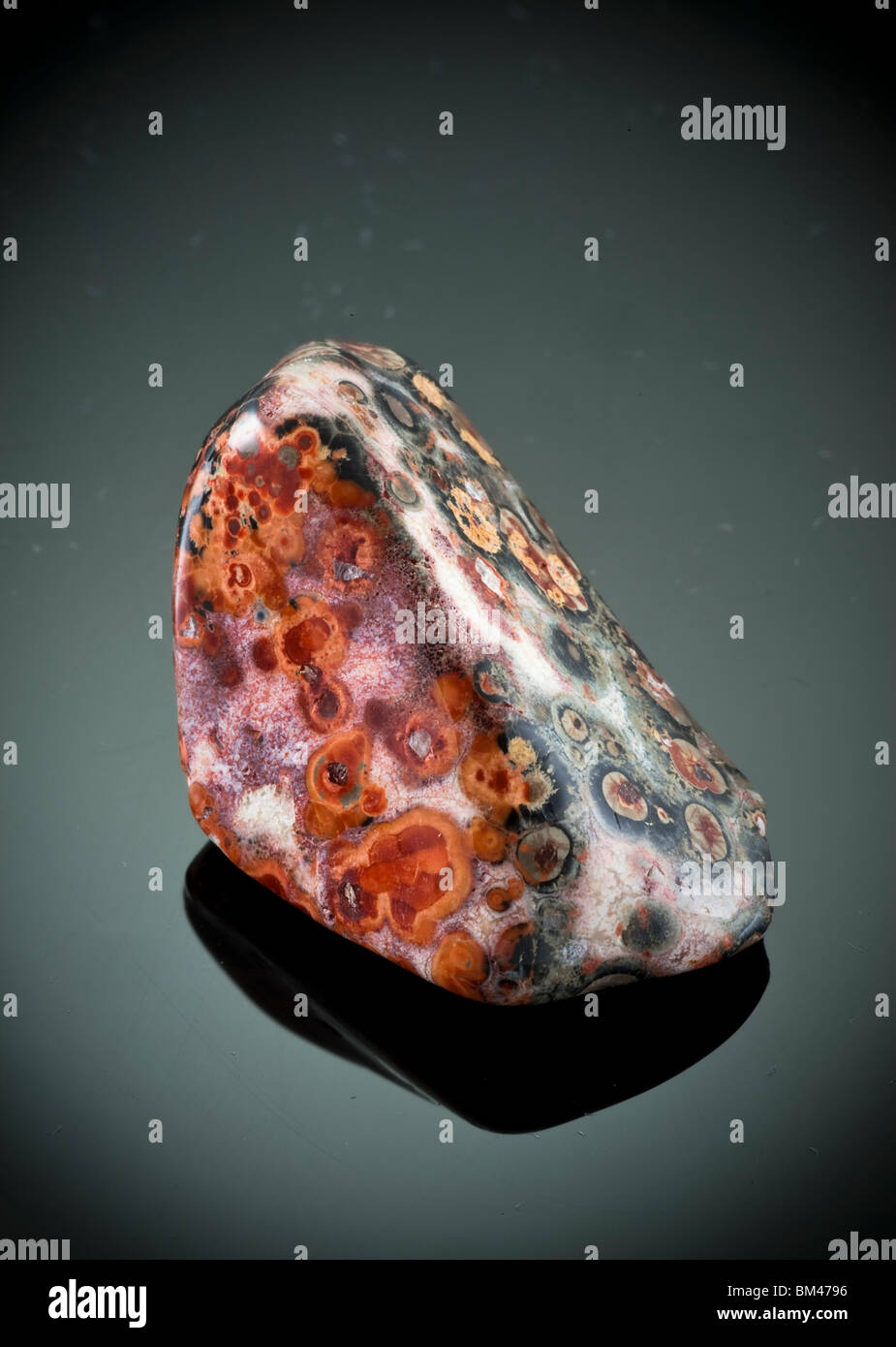 Cutout of a leopard skin gemstone on black background Stock Photo - Alamy
