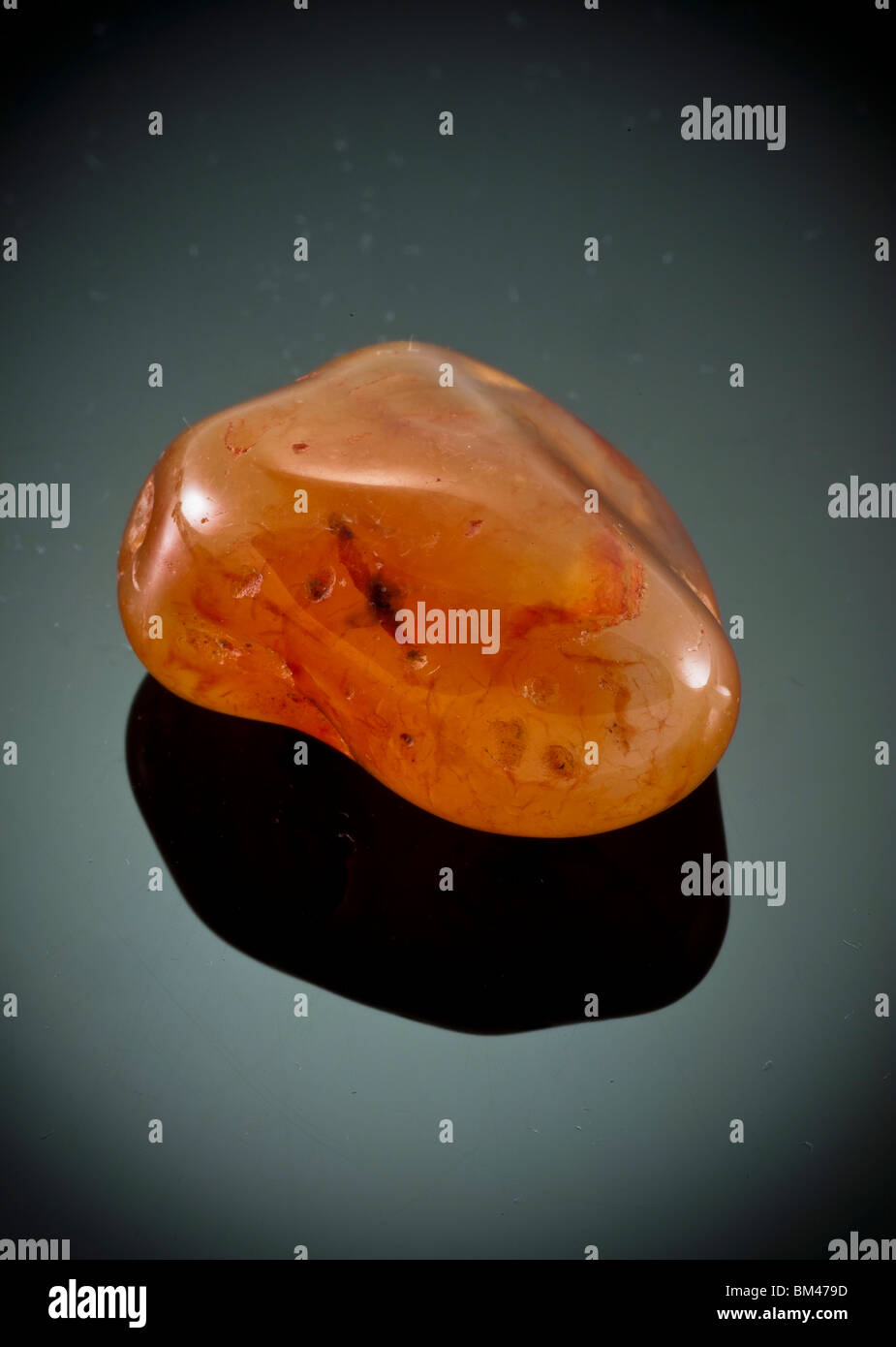 Cutout of a Carnelian (also spelled cornelian) gemstone on black ...