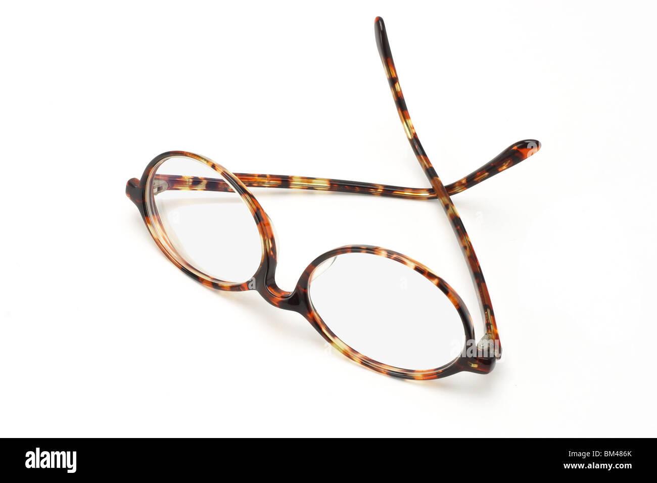 Old plastic frame spectacles on white background Stock Photo - Alamy