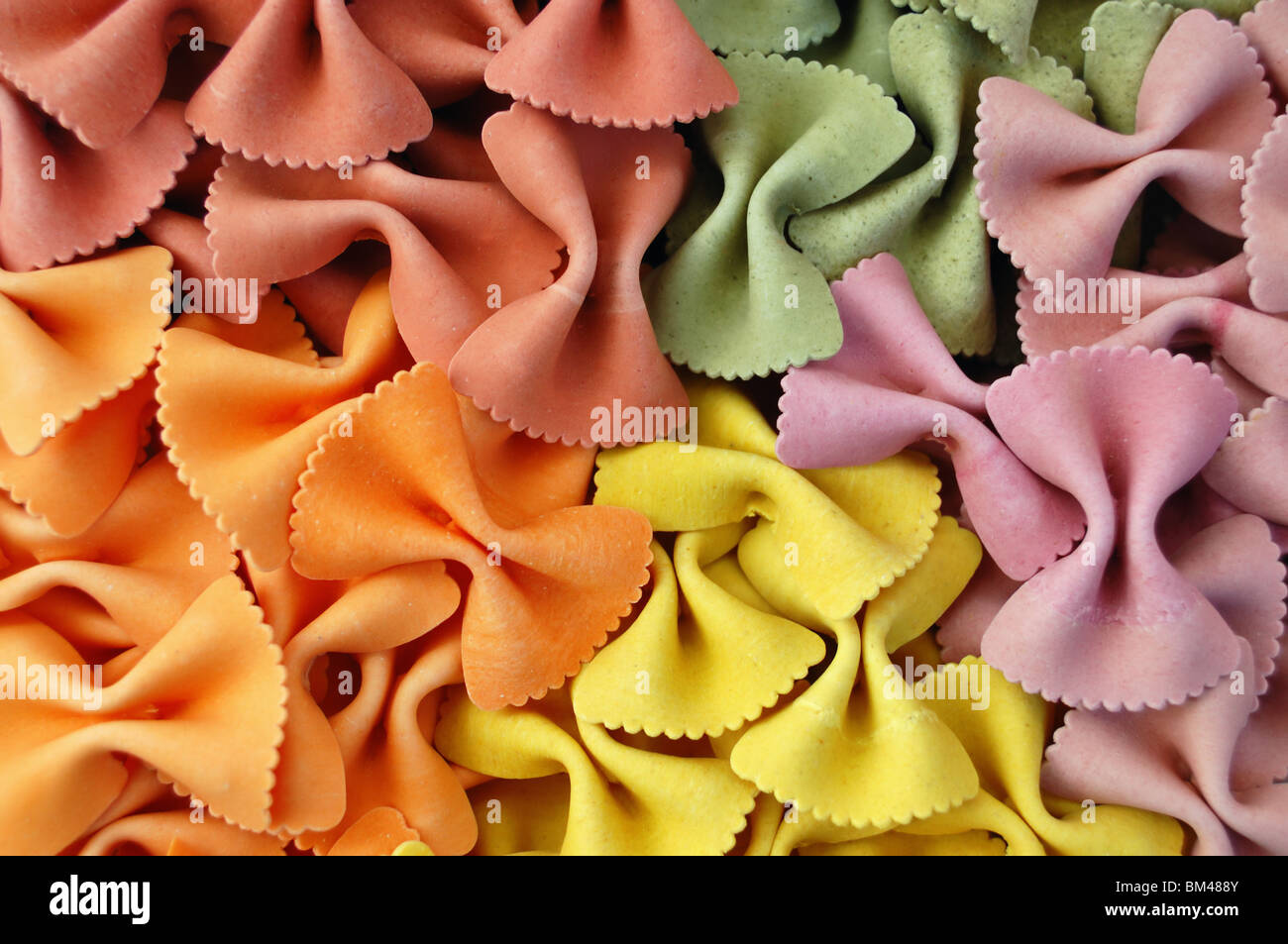 Italian farfalle pasta flavors. Creative food background Stock Photo ...