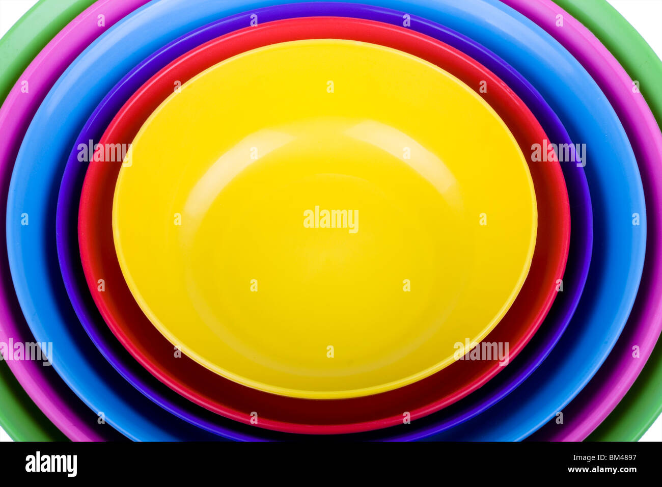 Stack of colorful plastic bowls Stock Photo - Alamy
