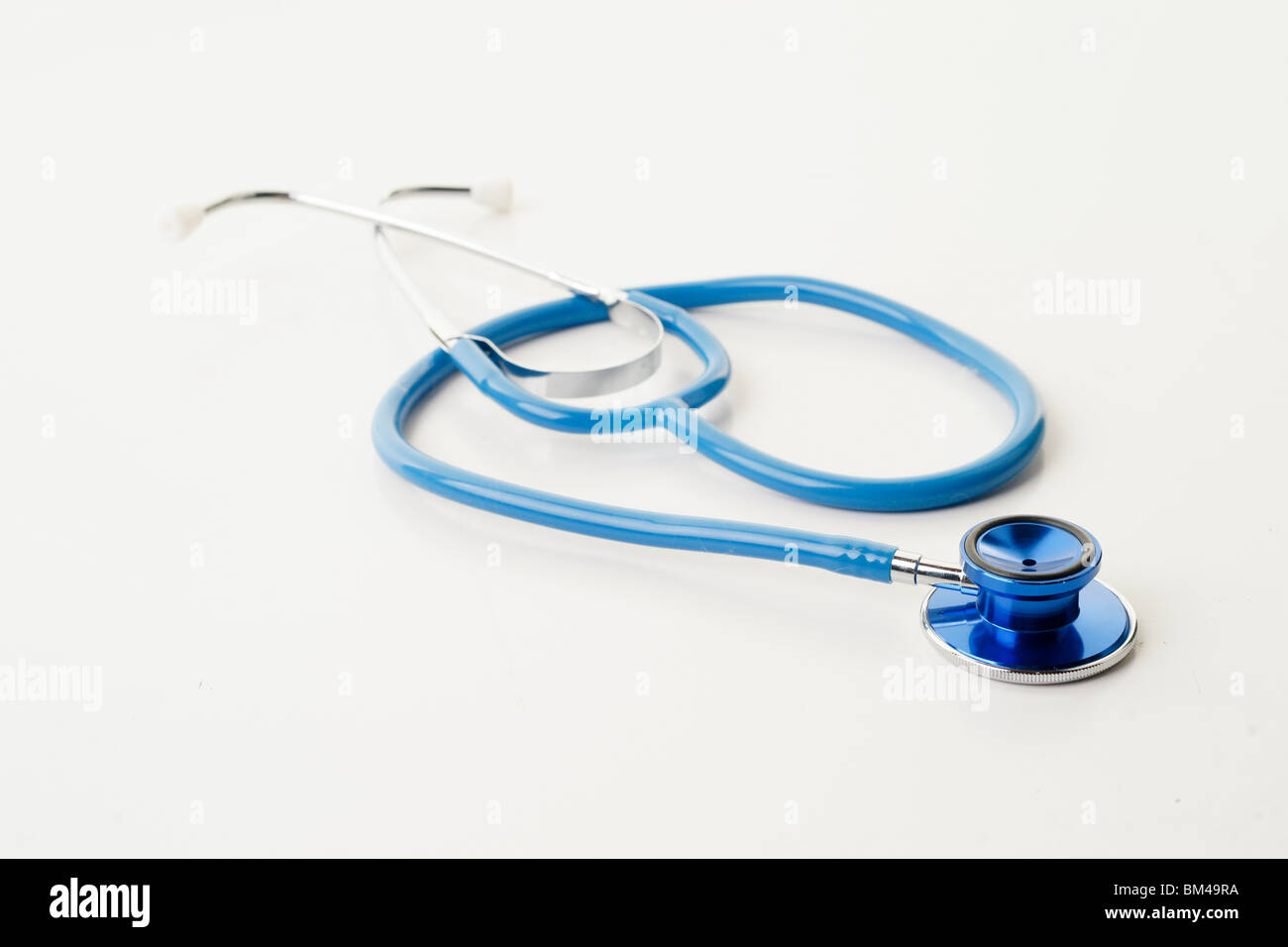 great image of a blue stethoscope on white Stock Photo - Alamy