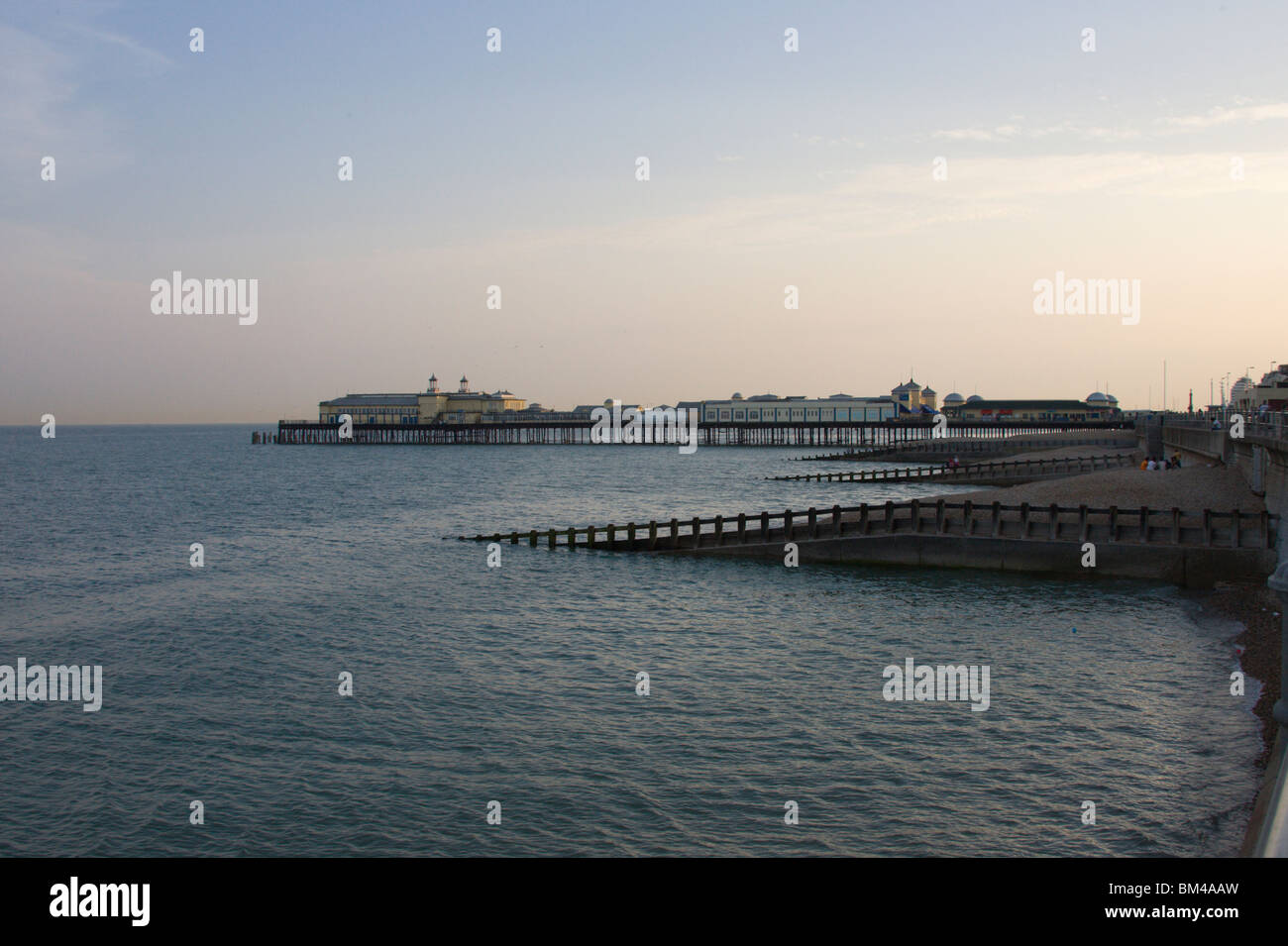 Hastings pier evening sunlight Stock Photo - Alamy