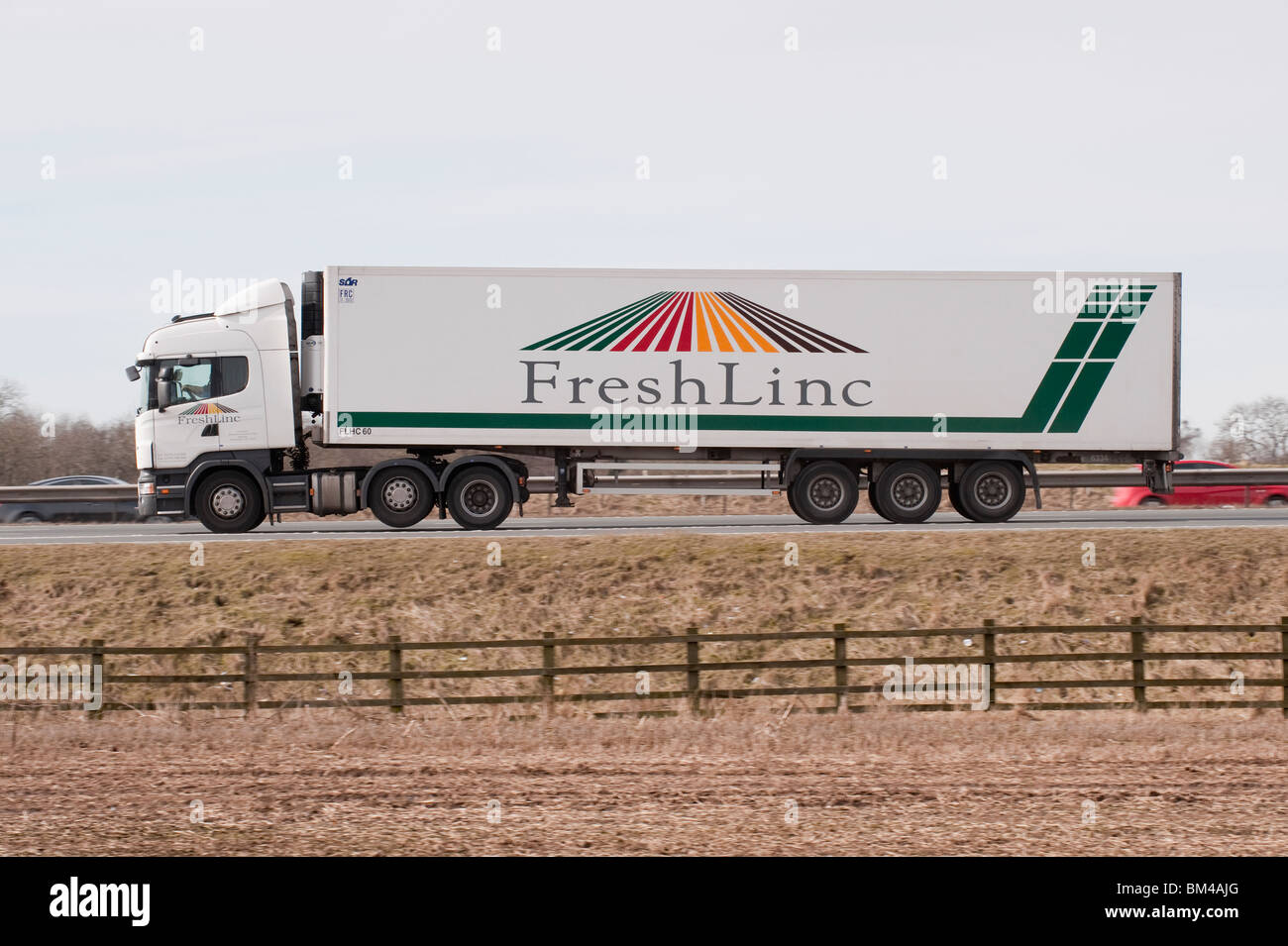 A lorry transporting goods for Freshline, travelling along the A1 ...