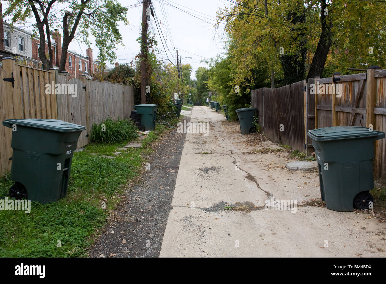 Refuse bins in back alley - USA Stock Photo - Alamy