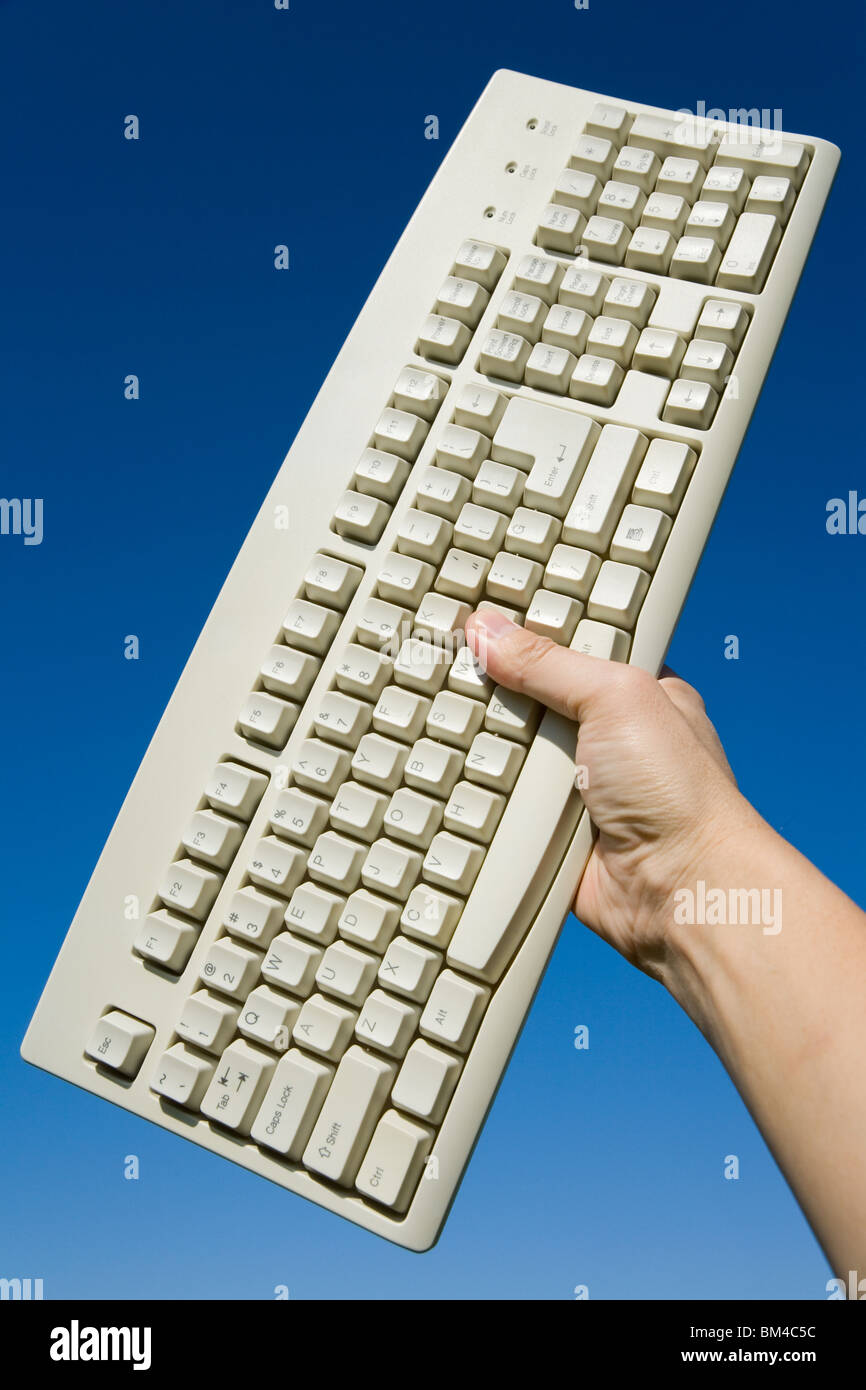 Computer Keyboard and blue sky, concept of freedom Stock Photo - Alamy