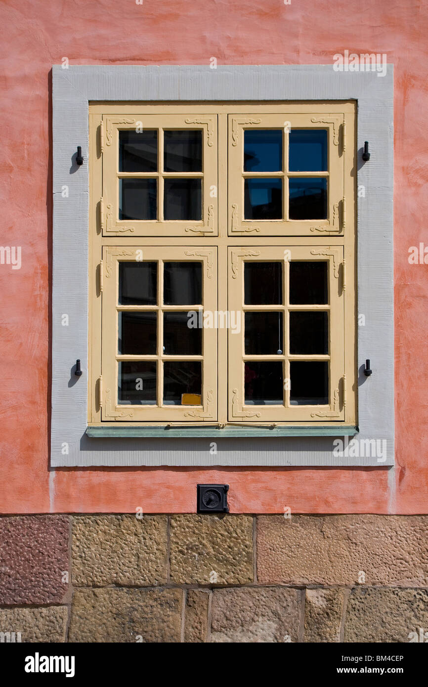 Yellow wooden window Stock Photo - Alamy