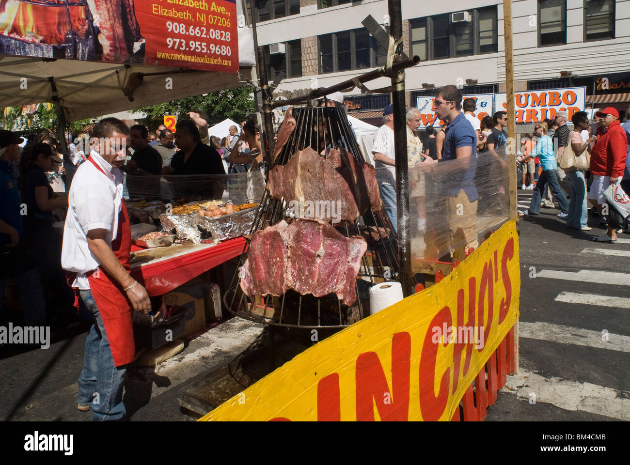 A stand selling ethnic food at the Ninth Avenue Food Festival in New ...