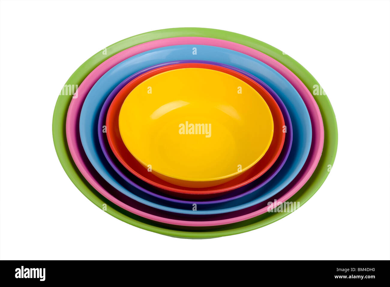 Stack of colorful plastic bowls over white background Stock Photo - Alamy