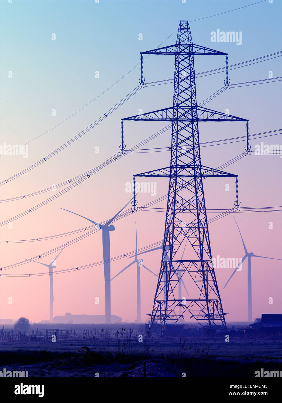 Electricity Pylons & Wind Farm Stock Photo - Alamy