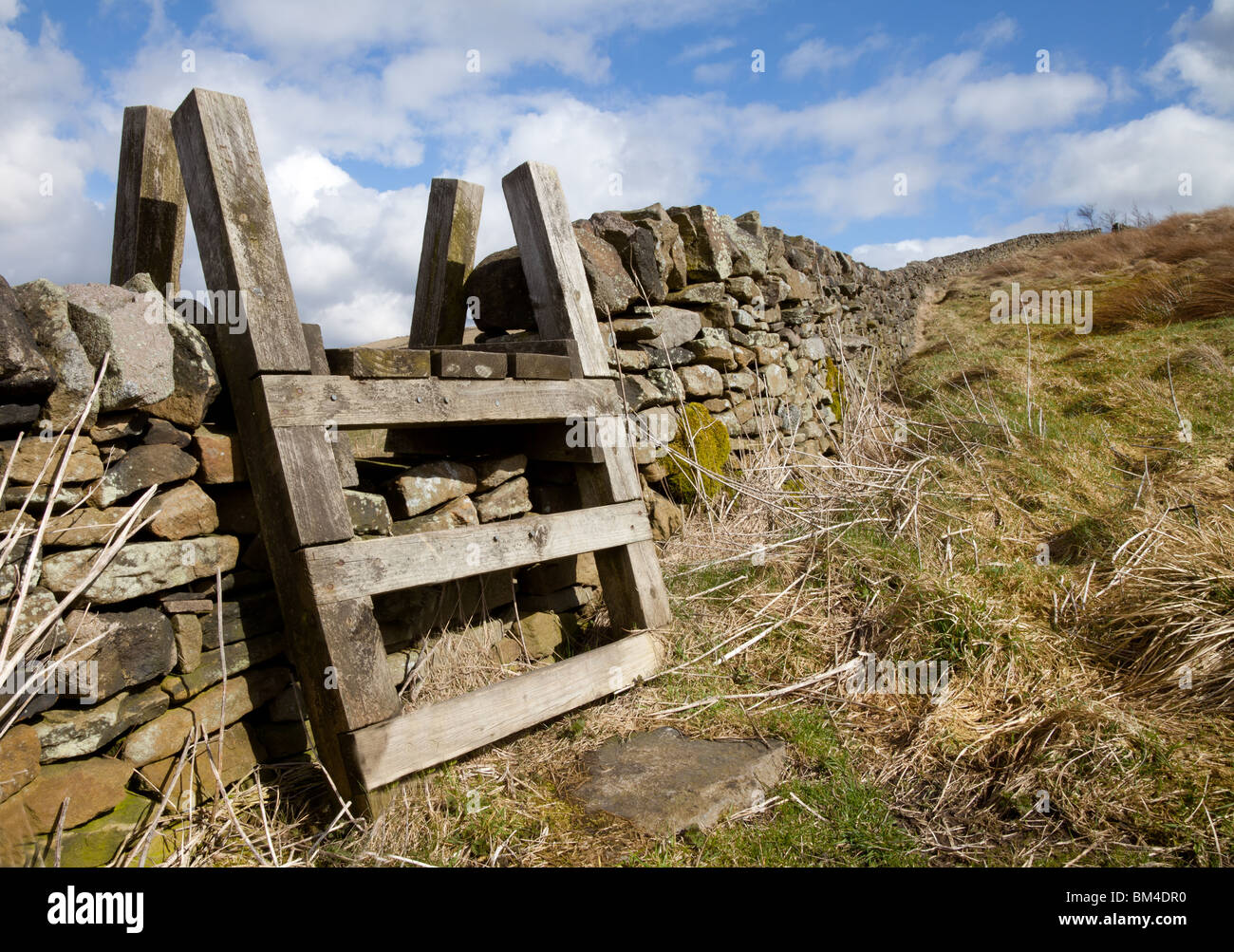 A country style on a footpath across the countryside in High Peak ...