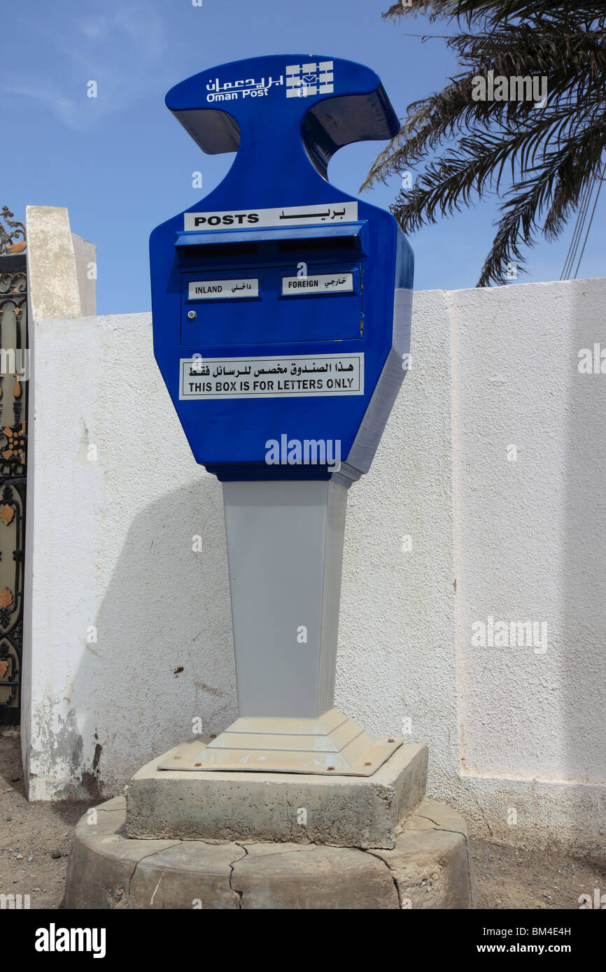 blue mailbox with bilingual mailing information. Sultanate of Oman ...