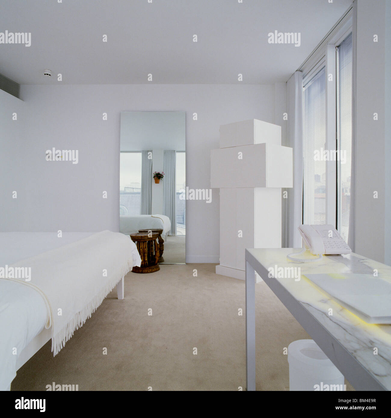 White minimal hotel suite designed by Philippe Starck, St Martins Lane ...