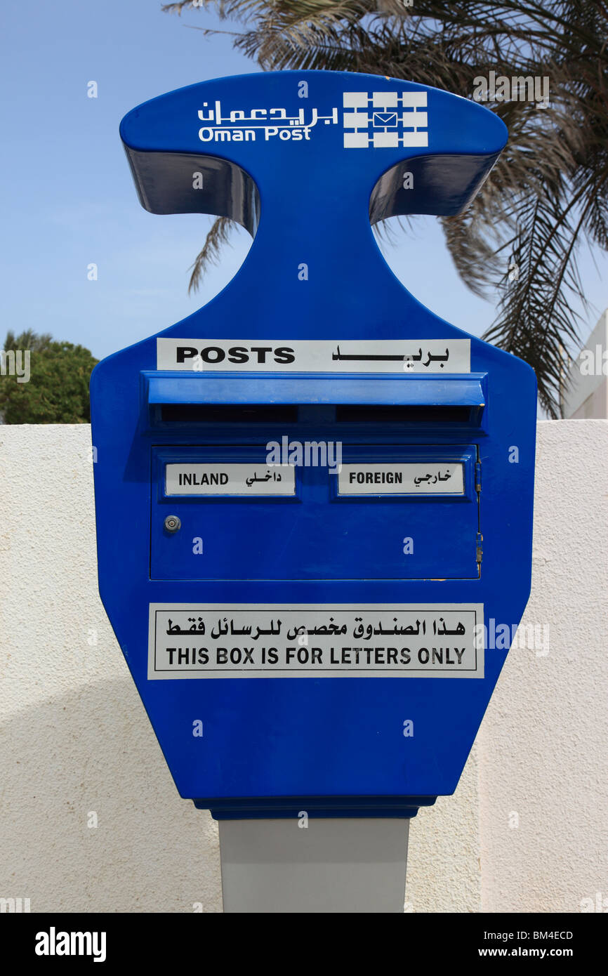 blue mailbox with bilingual mailing information, Sultanate of Oman ...