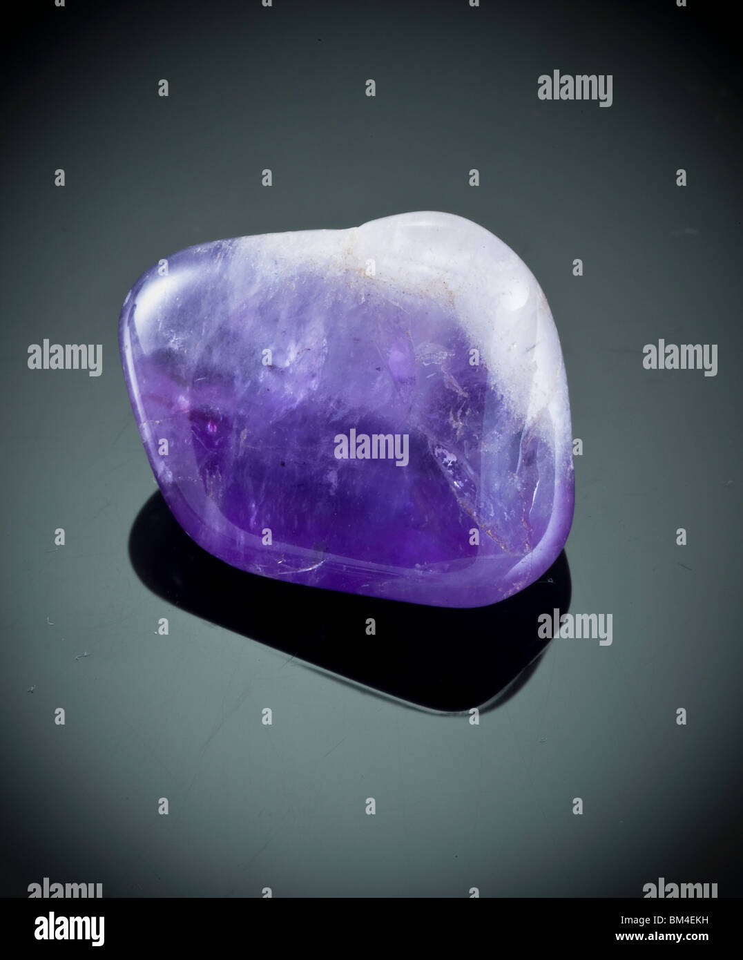 Cutout of an amethyst gemstone on black background Stock Photo - Alamy
