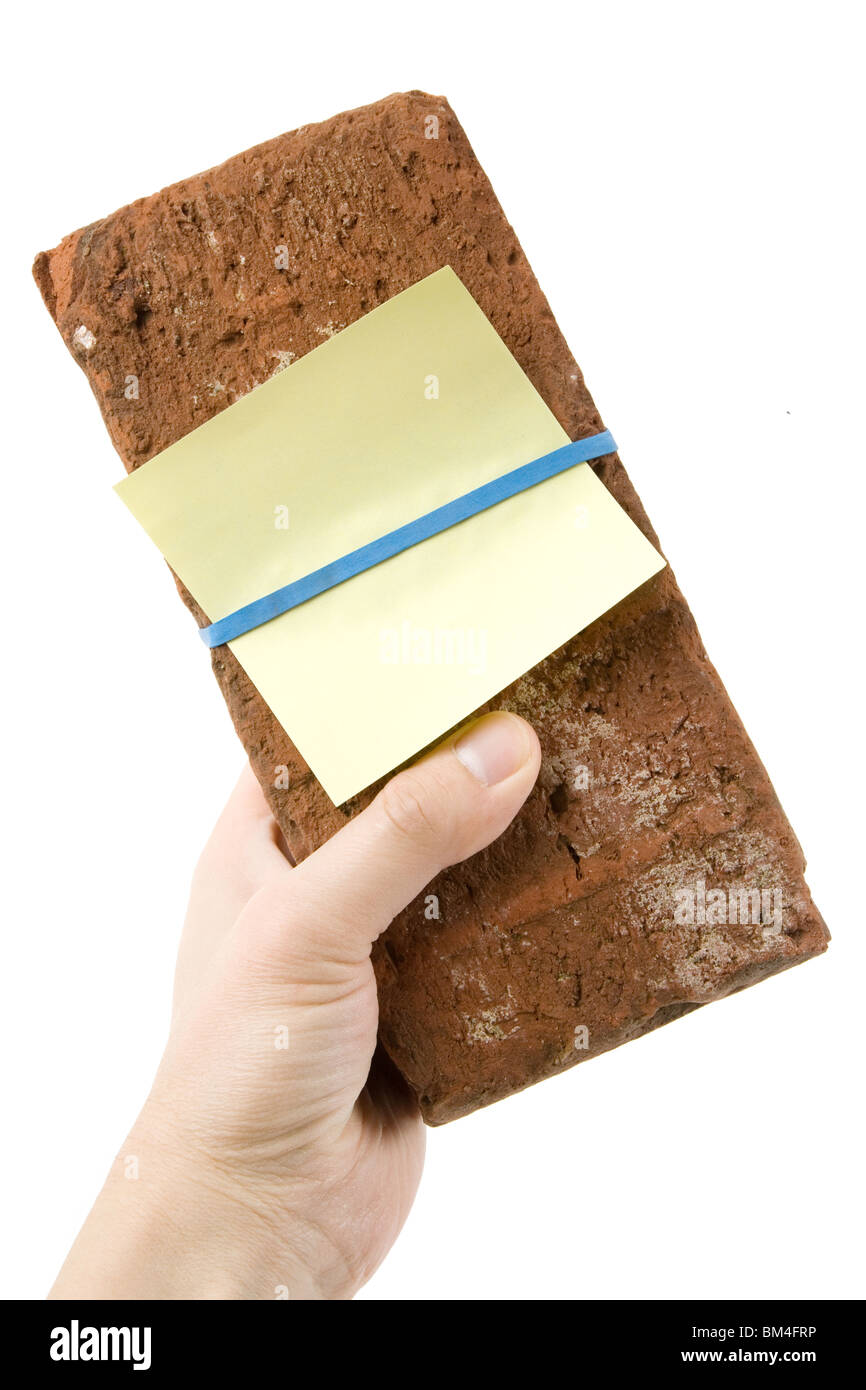 Red Brick and Threat letter, Message tied on to a brick Stock Photo - Alamy