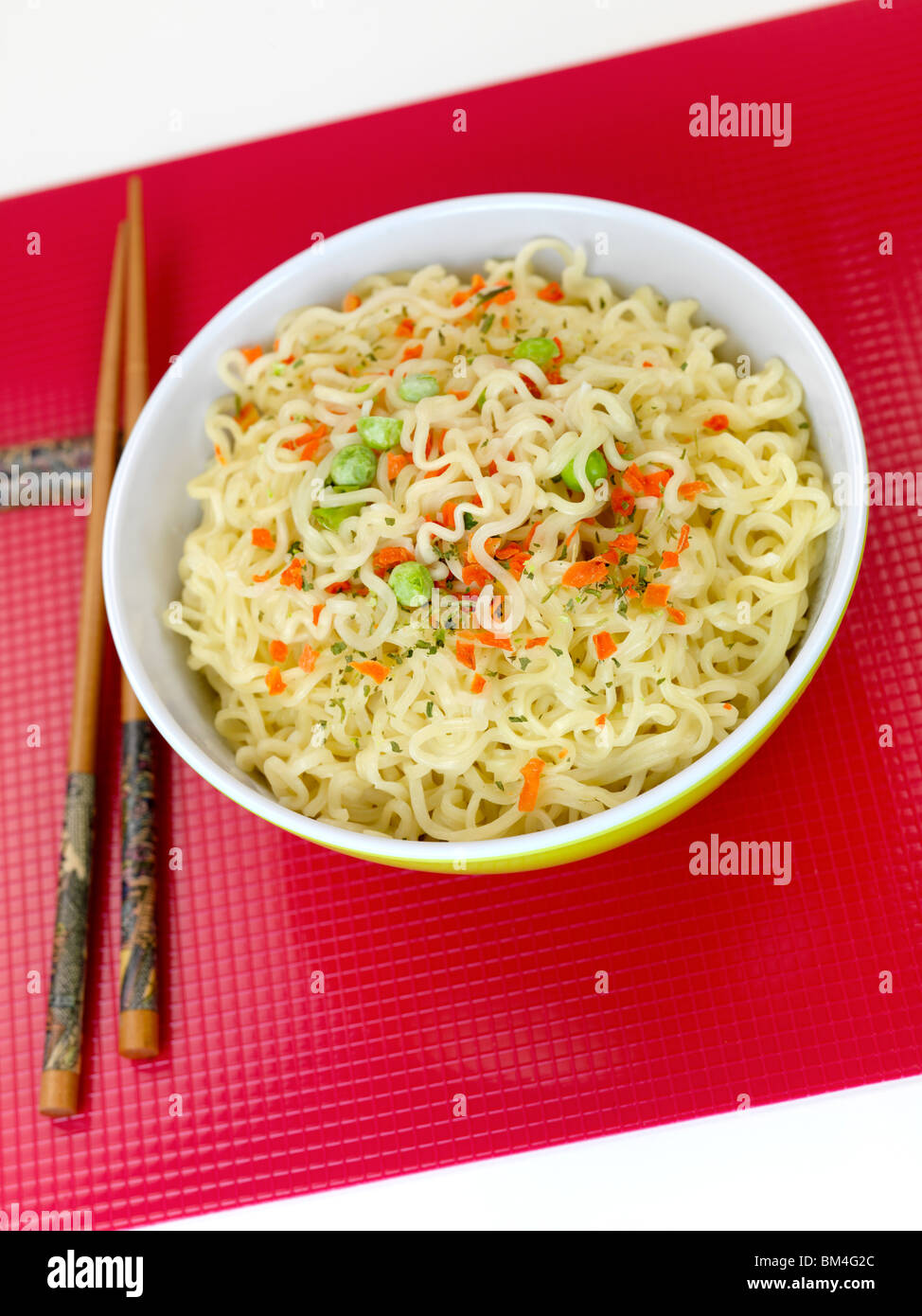 Cooked instant noodles isolated against a white background Stock Photo ...