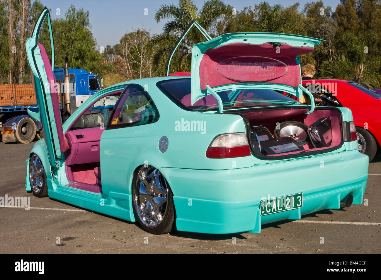 Custom car with boot open at car show Stock Photo - Alamy