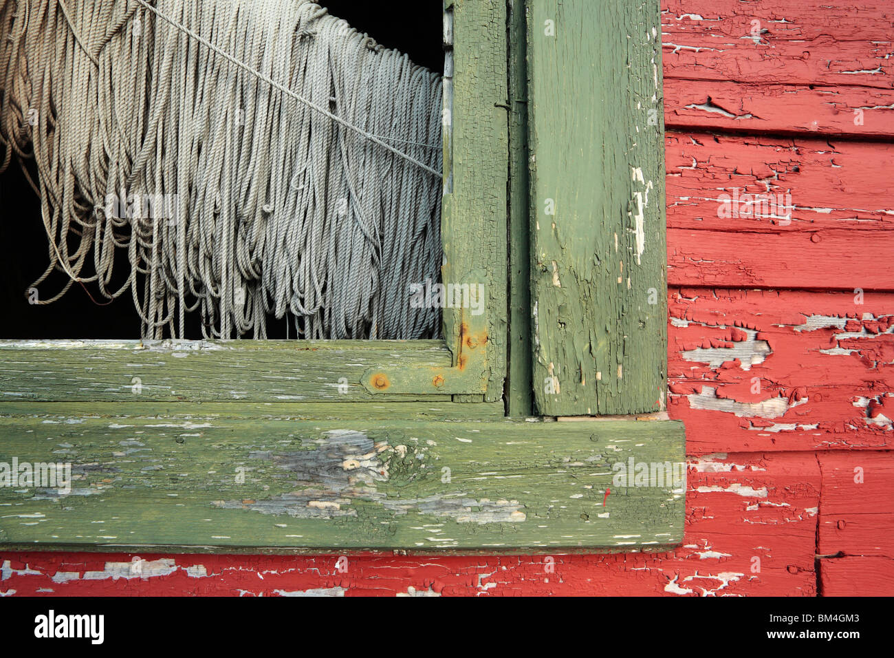 Fishing line and hooks as seen through the window of an old fishing ...