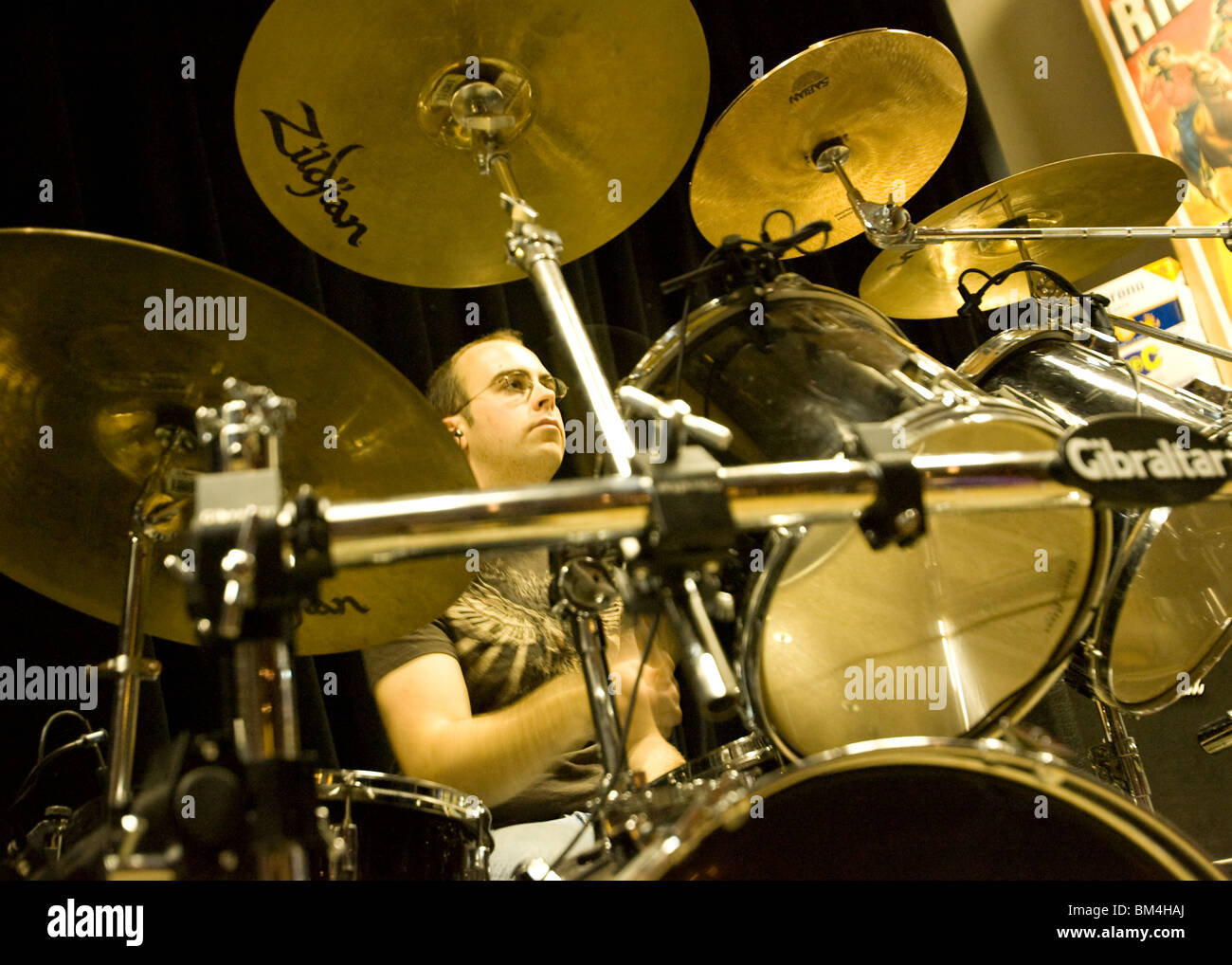 Drummer on stage from below Stock Photo - Alamy