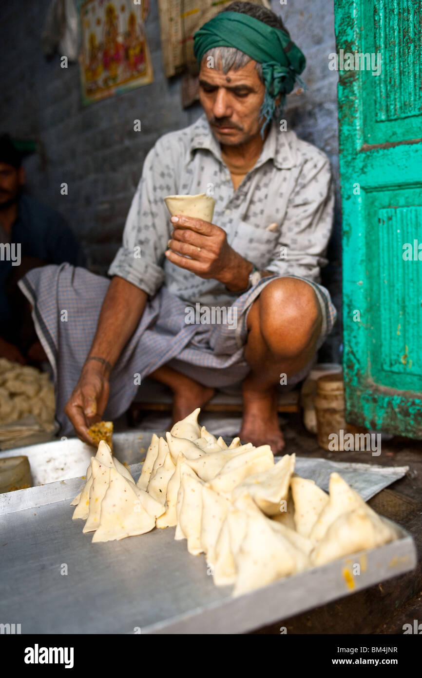 An Indian man making samosas Stock Photo - Alamy