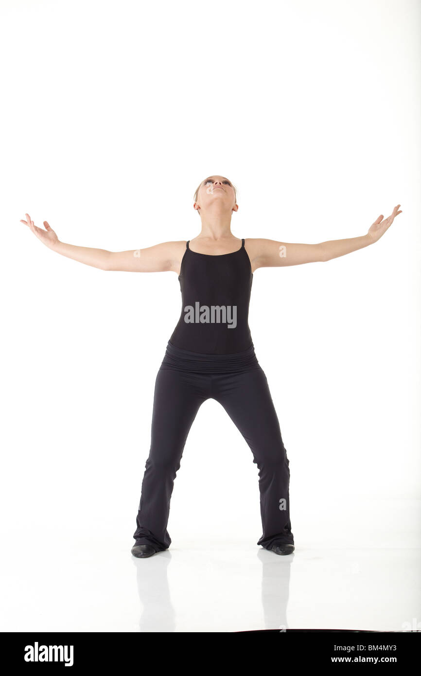 Young caucasian Modern Jazz dancer in a black top and black pants on a ...