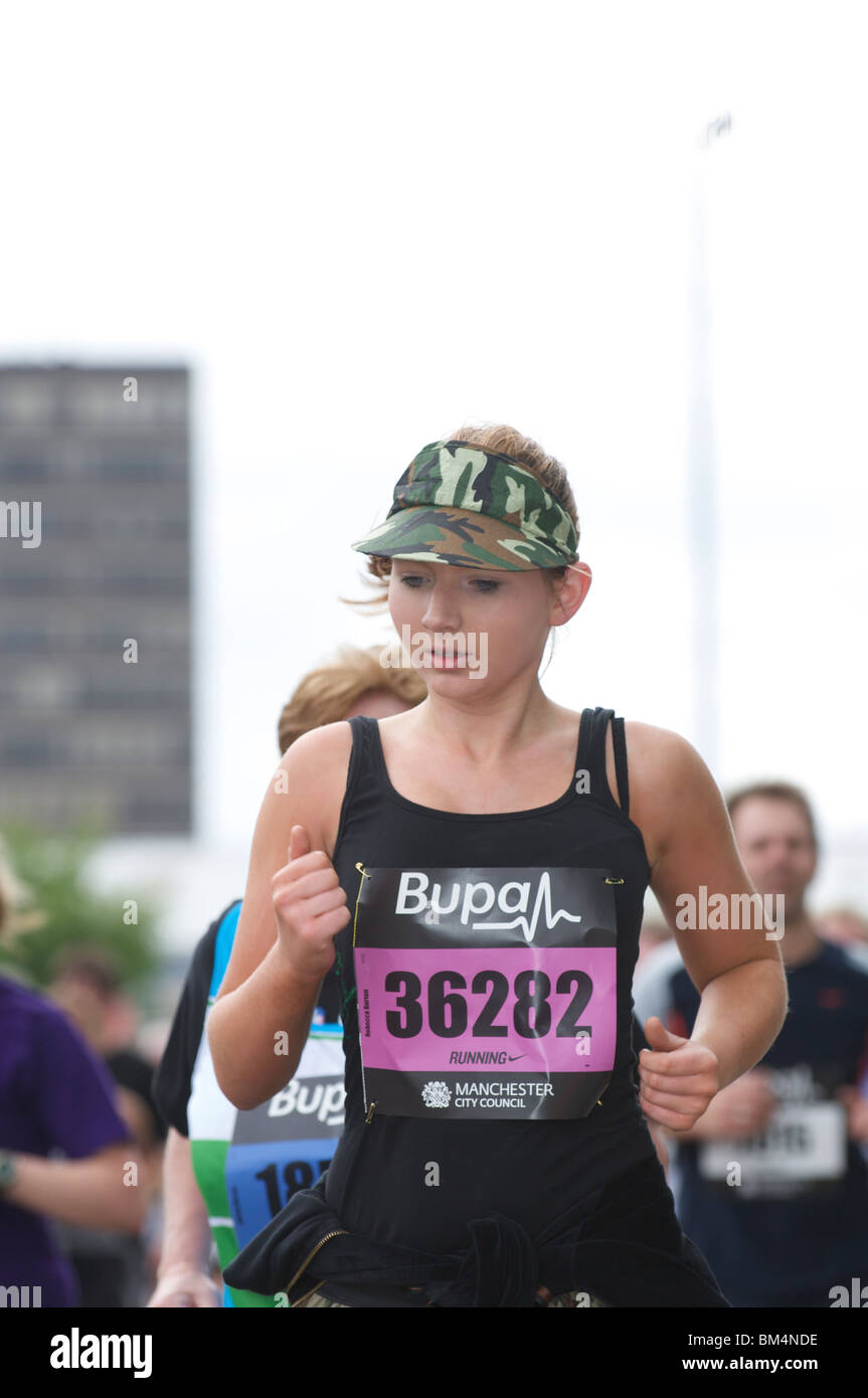 female runner in the manchester 10k road race , 2010 Stock Photo - Alamy