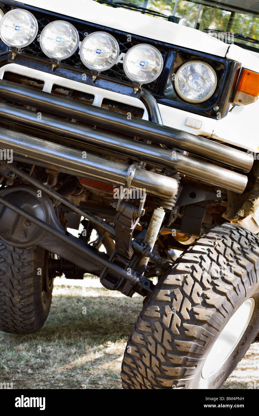 Rugged offroad vehicle in extreme terrain Stock Photo - Alamy