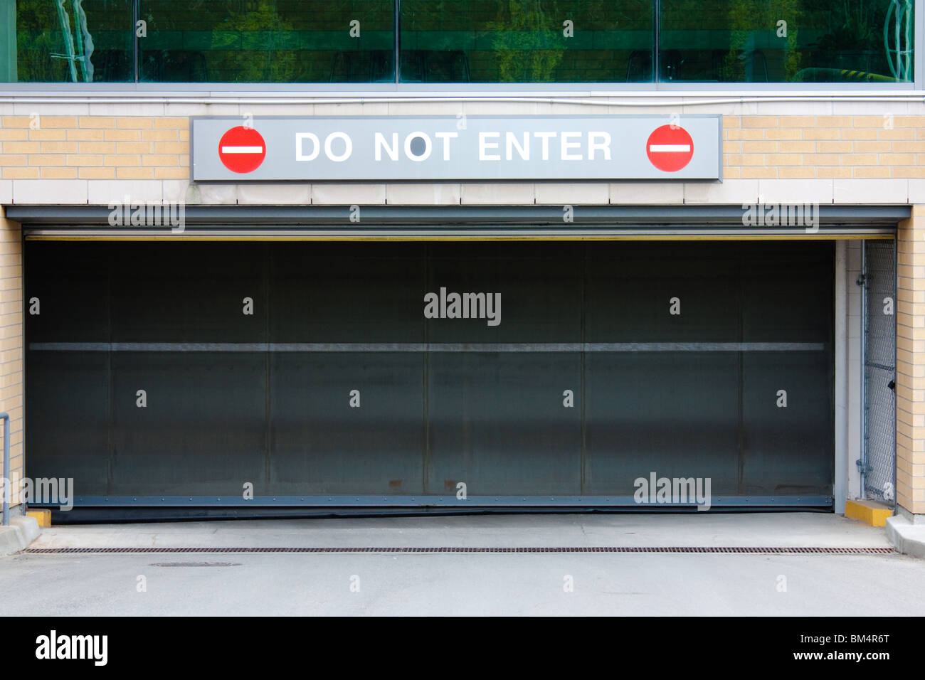 Do not enter sign underground car garage door Stock Photo - Alamy