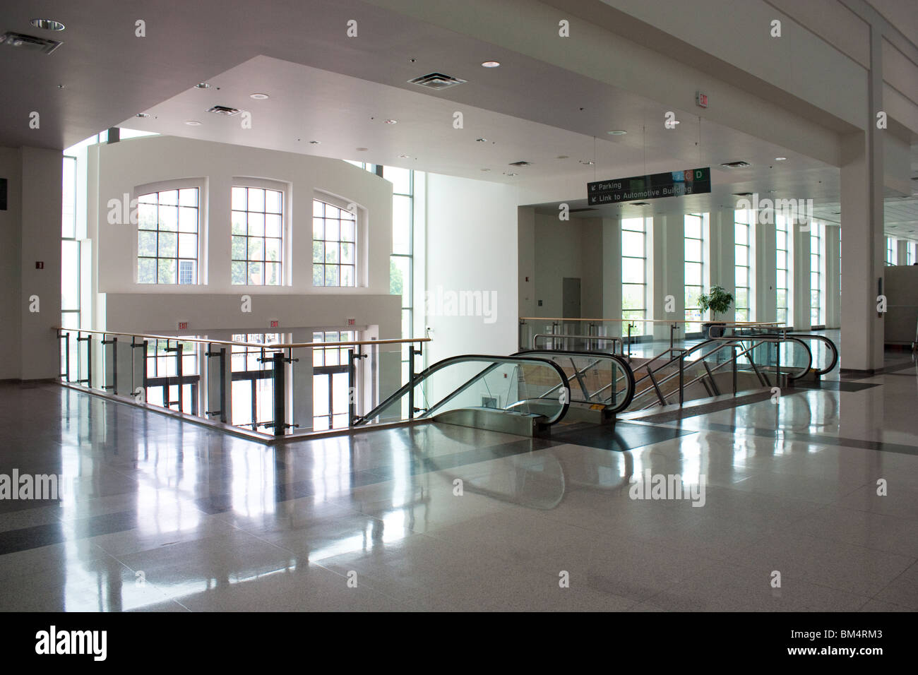 entrance convention hall escalator marble floor large window Stock ...