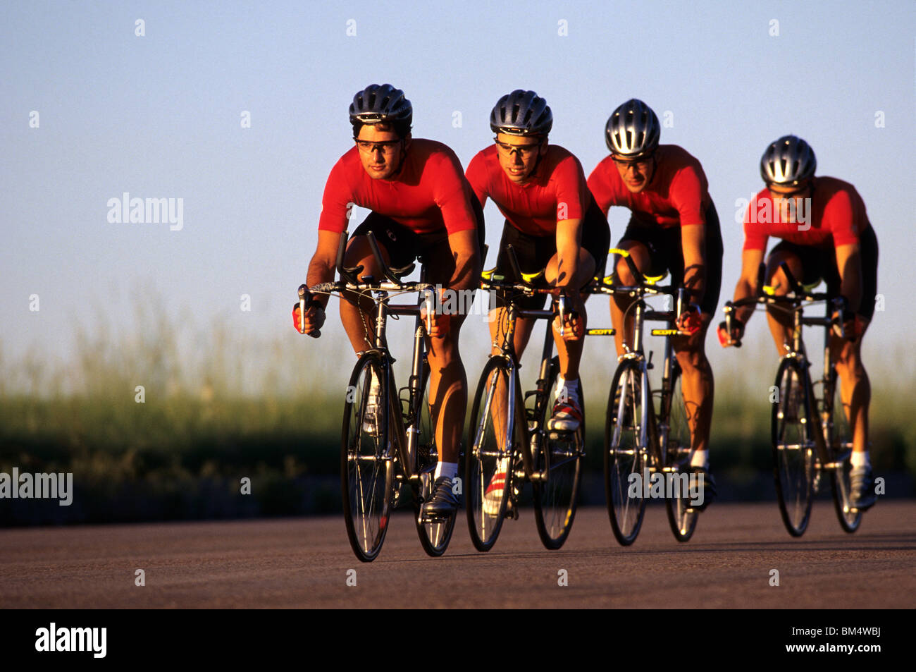 Road cycling team competing Stock Photo - Alamy
