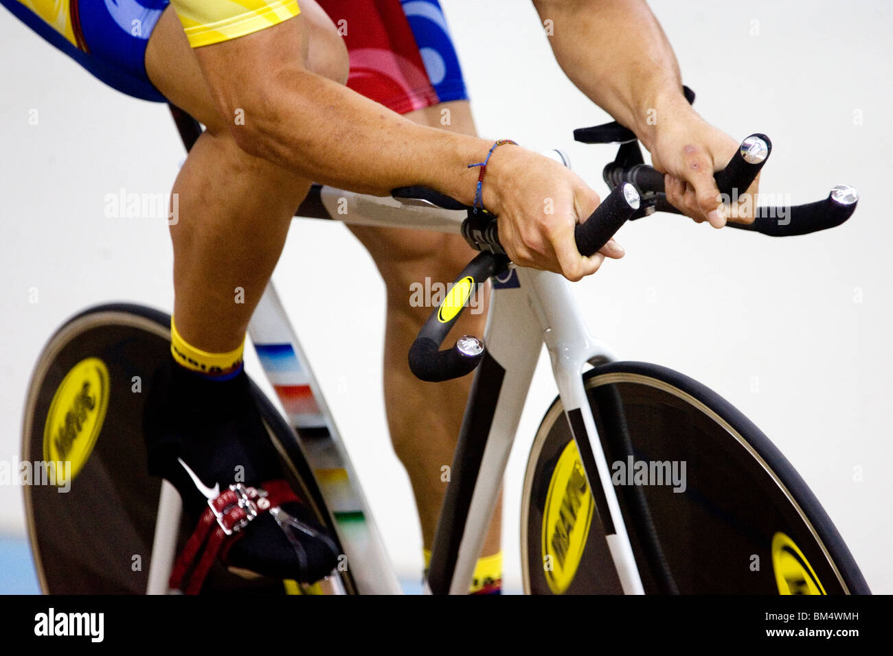 Detail of cyclist racing on the velodrome track Stock Photo - Alamy