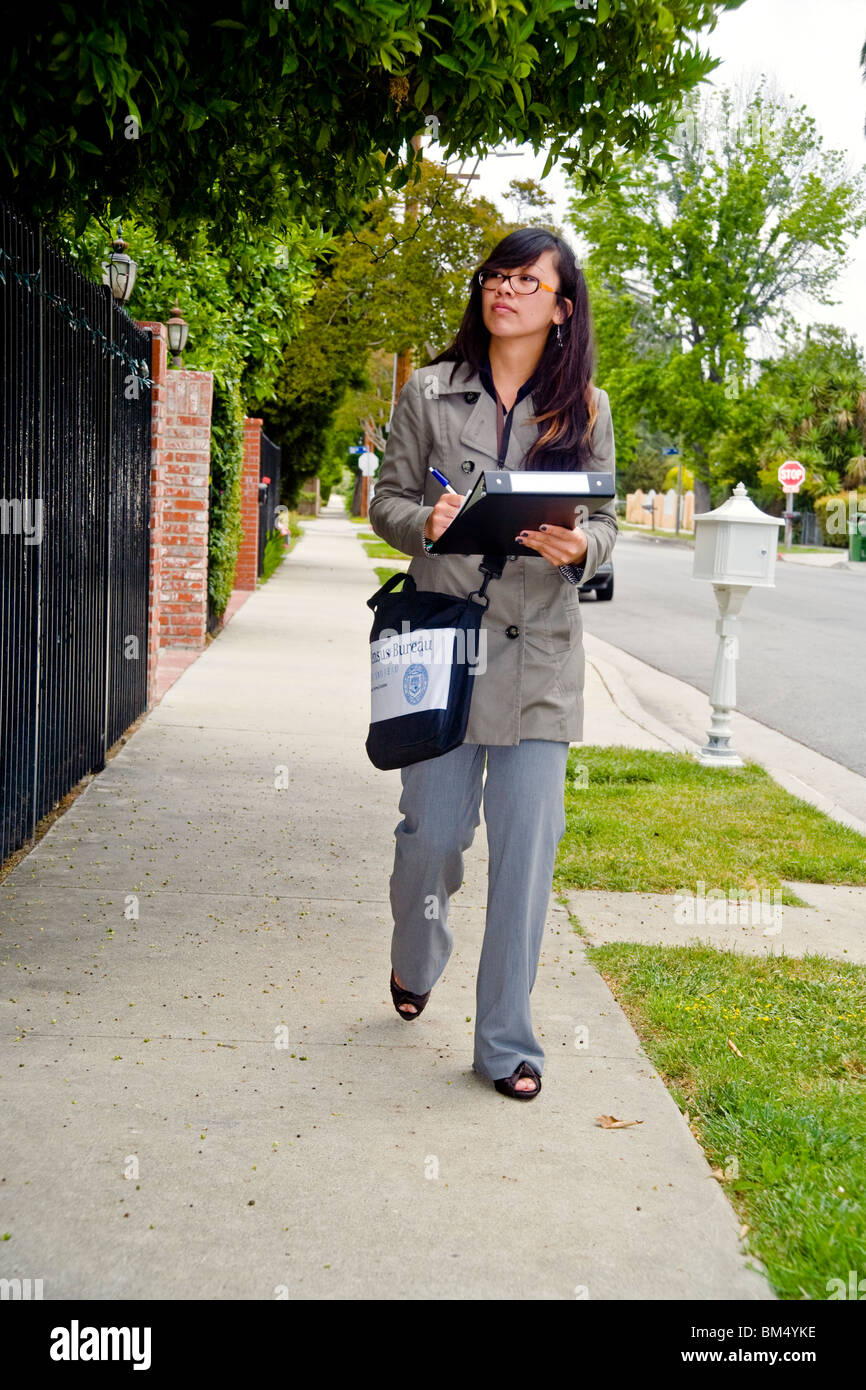 Carrying her official shoulder bag, an Asian-American 2010 U.S. Census ...