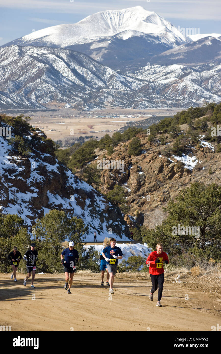 Runners compete in a marathon race near the small mountain town of ...