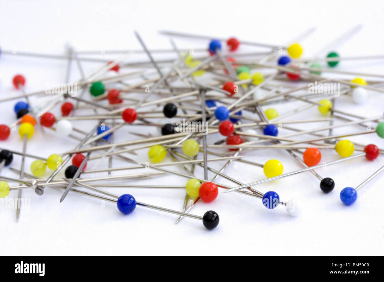 pins on a white background Stock Photo - Alamy