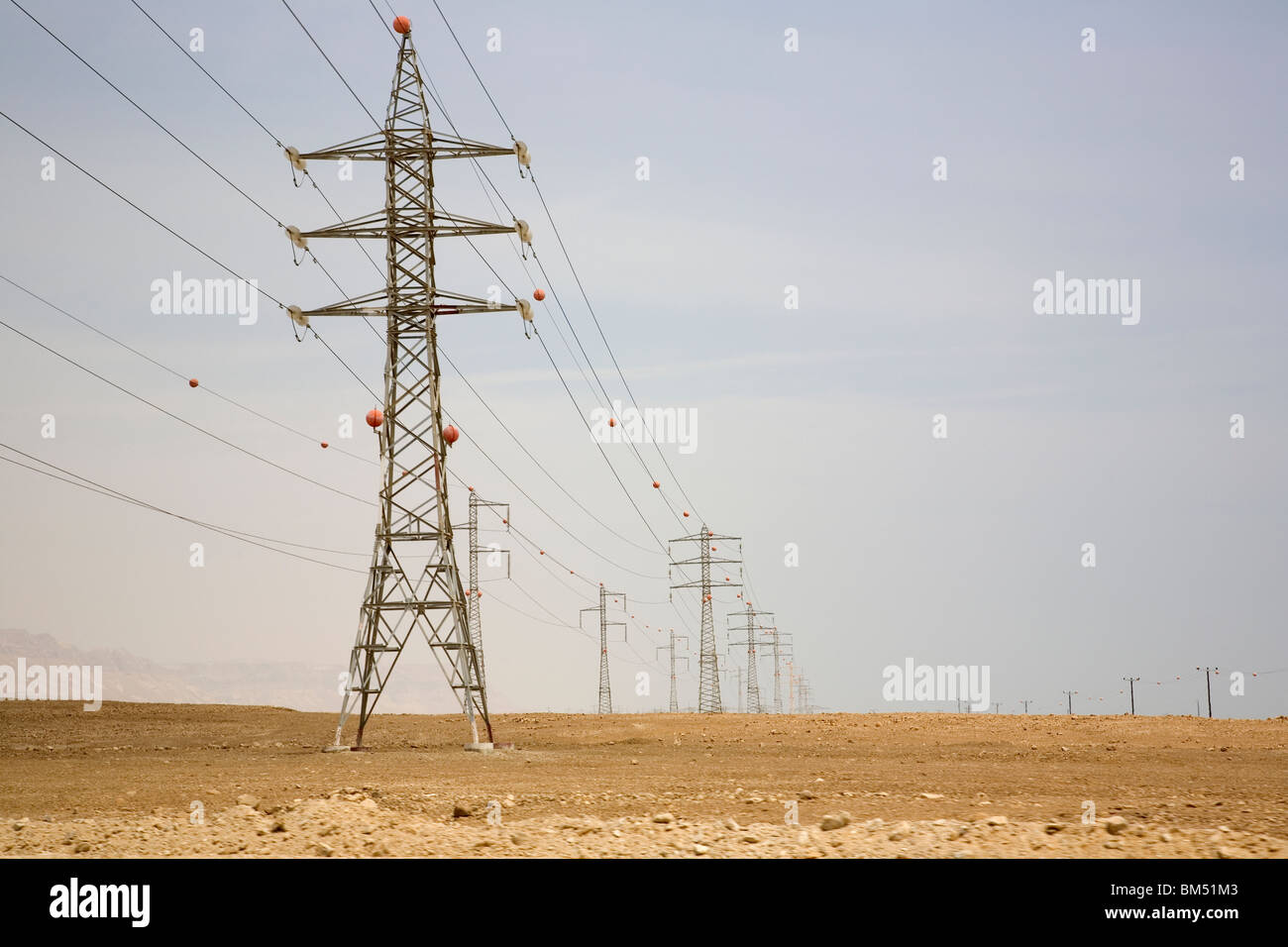 Power pylons in the desert hi-res stock photography and images - Alamy