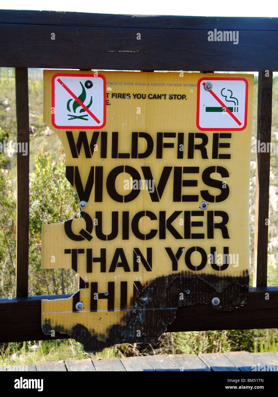 burned signboard, to warn for fire Stock Photo - Alamy