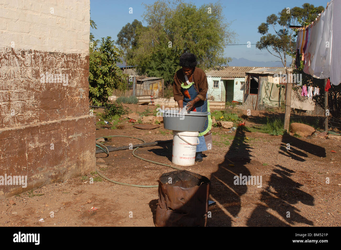 woman washing outside Stock Photo - Alamy