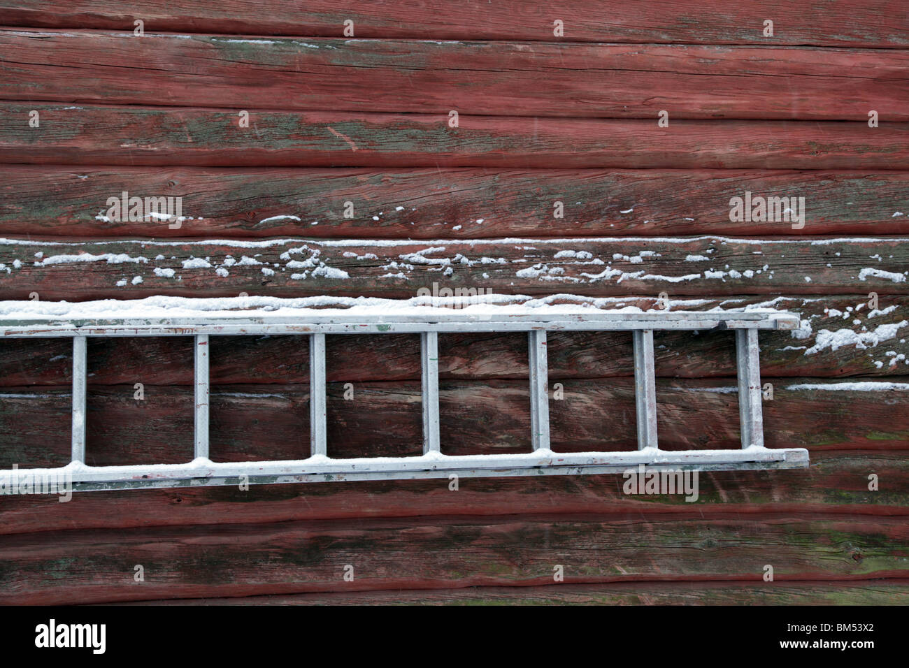 Ladder detail of a traditional Scandinavian red barn on a farm in ...